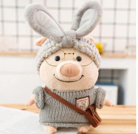 Cerdito vestido con jersey gris • Mi Peluche
