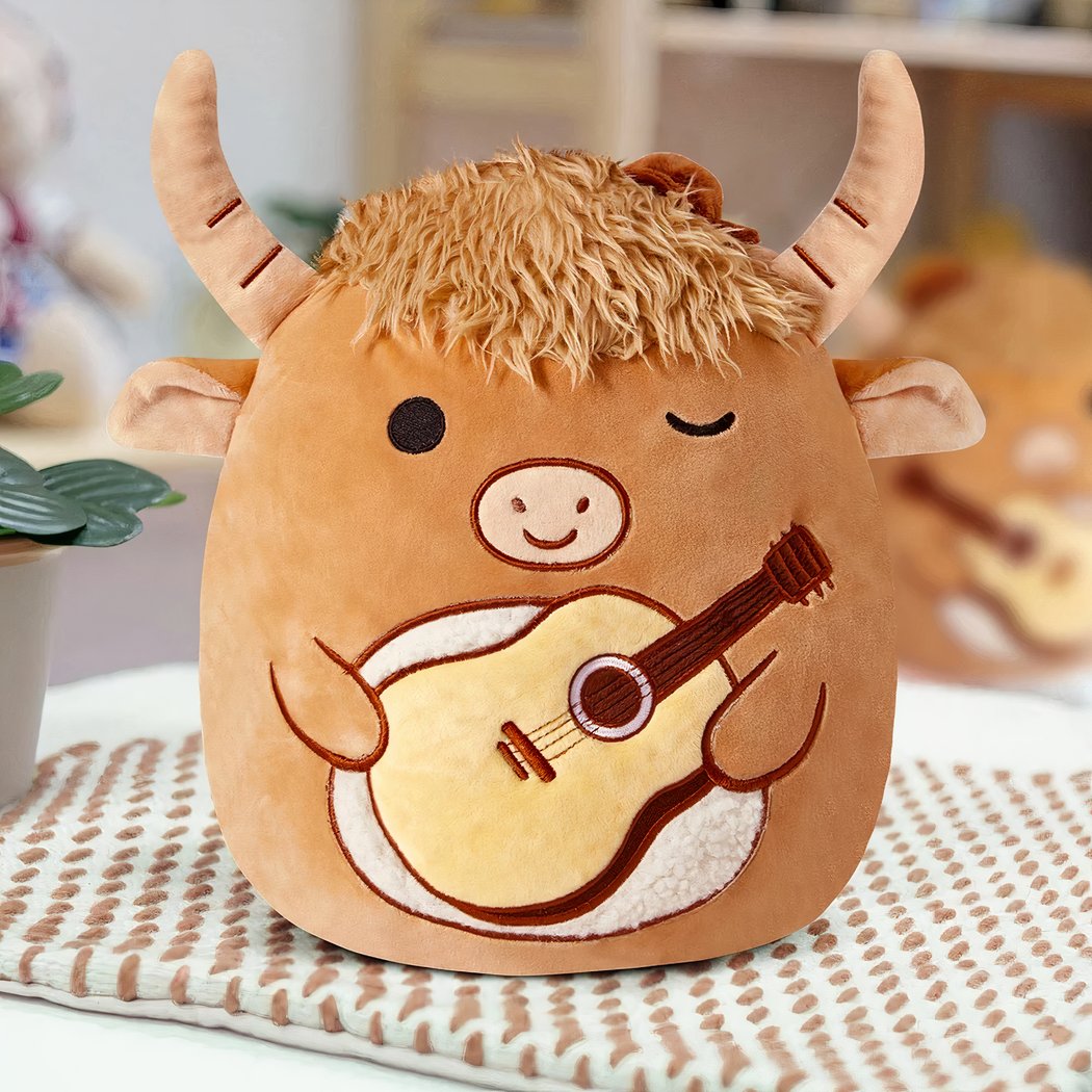 Peluche Squishmallow toro con guitarra • Mi Peluche